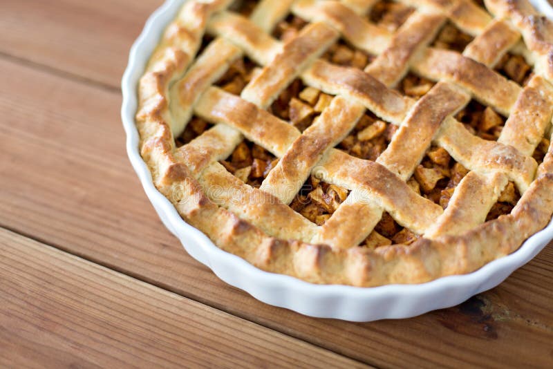 Close Up of Apple Pie in Mold on Wooden Table Stock Image - Image of ...