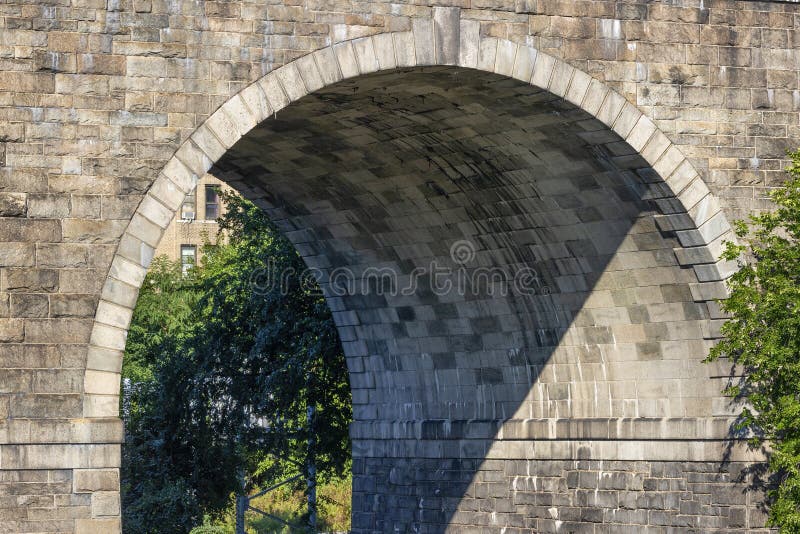 Close Up of an Arch Under Section of a Bridge Stock Image - Image of ...
