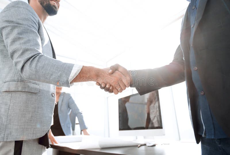Close Up.architect and Customer Shaking Hands in the Main Office Stock ...