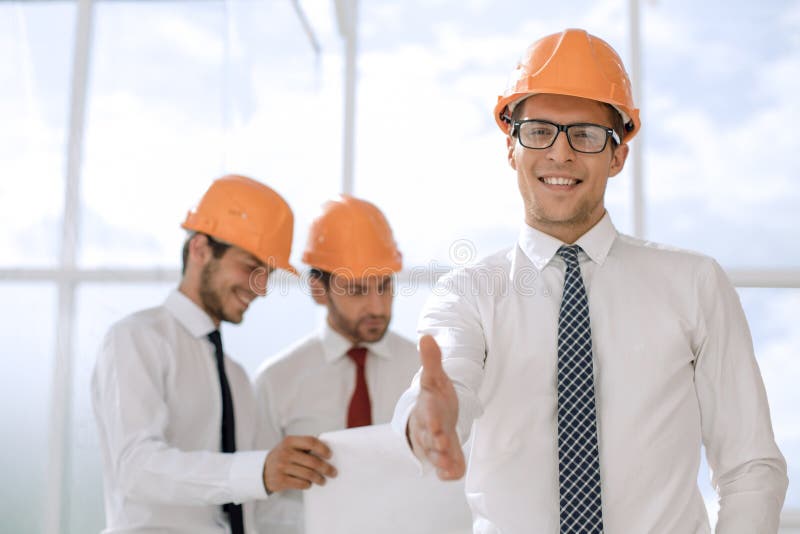 Architect Reaching for Document while Working on Blueprint Stock Photo ...
