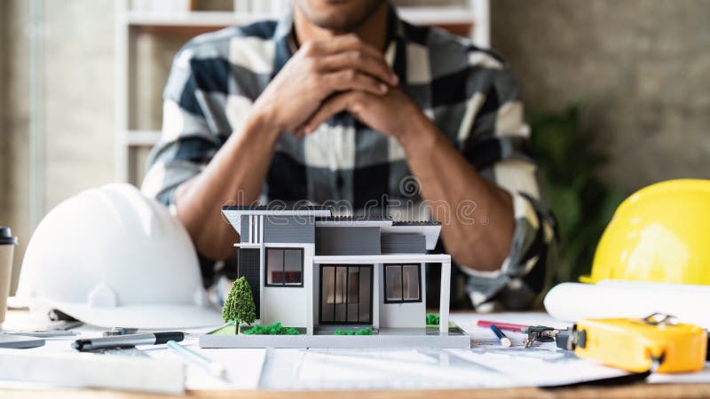 Close Up of Architect Team Working with House Model for Architectural ...
