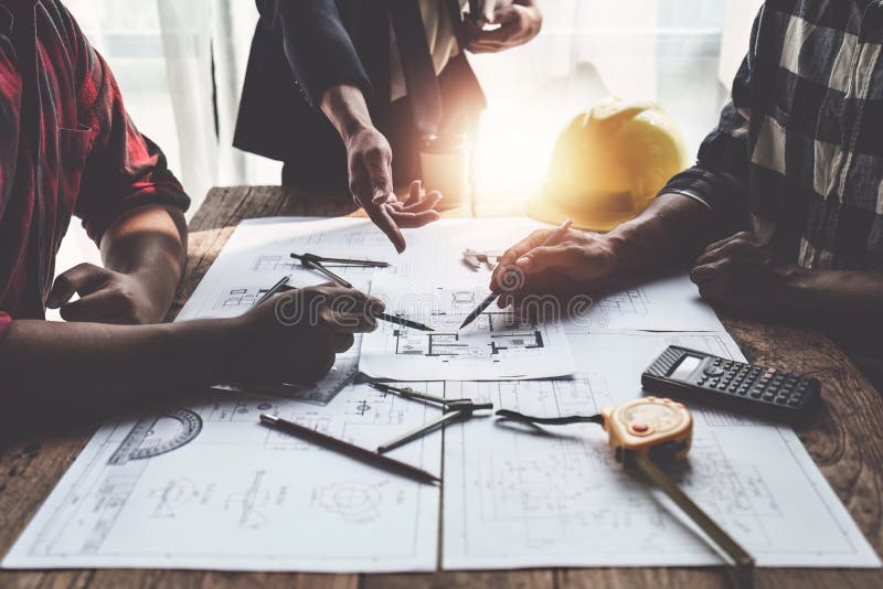 Close Up of Architect Team Working with House Model for Architectural ...