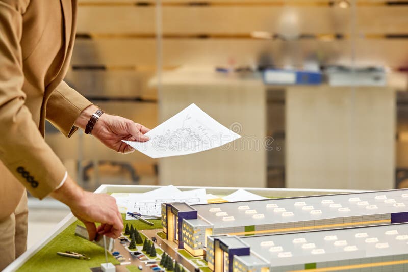 Concentrated Architect Man Working with Building Layout, Architectural ...