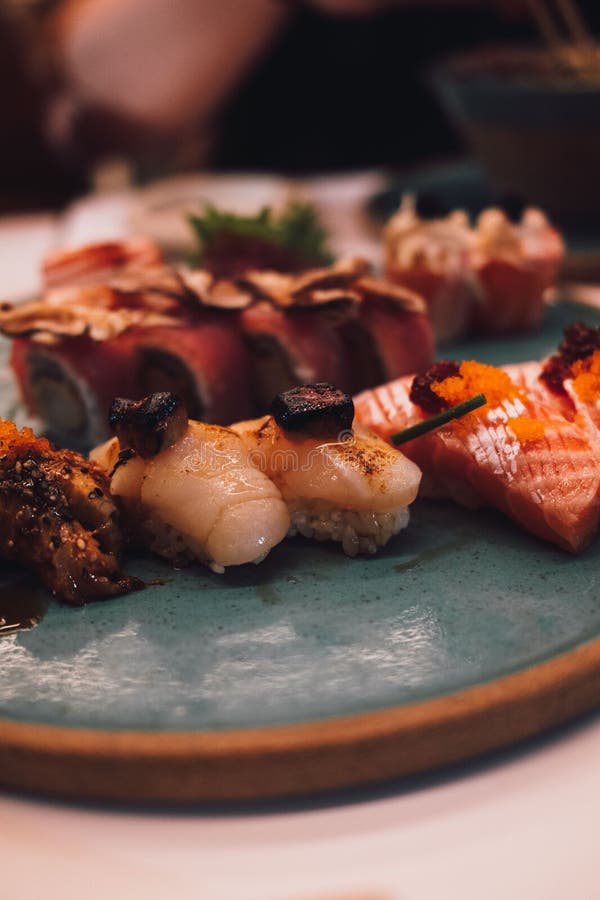 Close-up of Artful Sushi Platters Set on a Dining Table. Stock Image ...