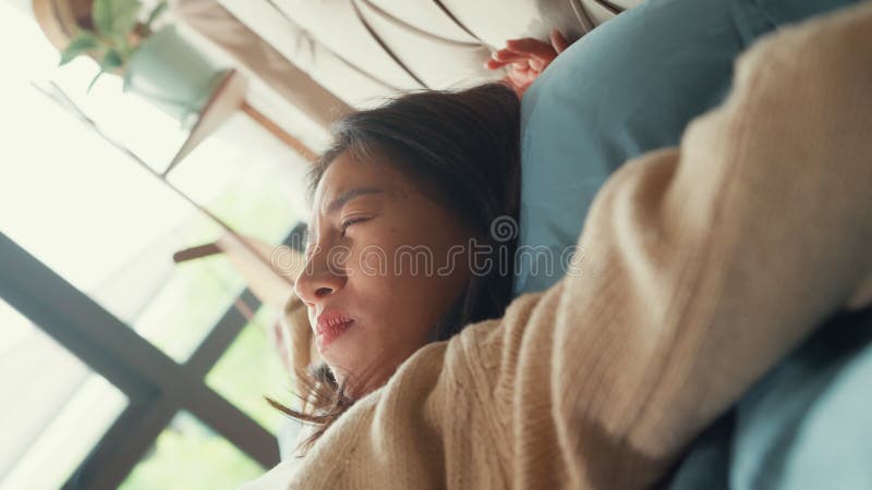 Close Up Asian Girl With White Cream Pajamas Sleep On Pillow Wake Up