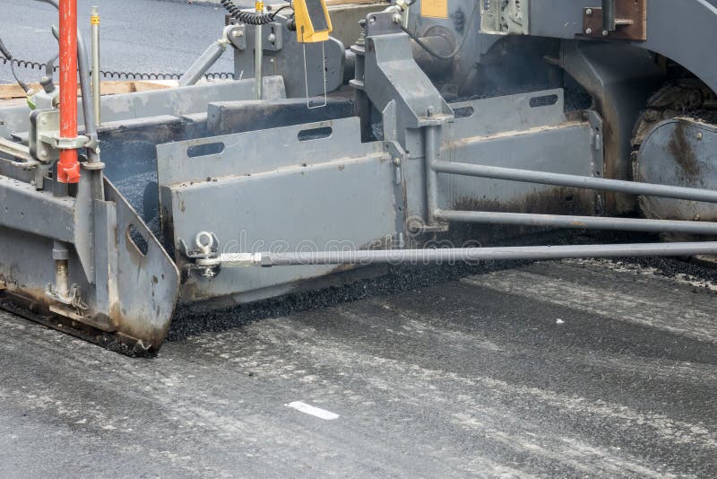 Close Up Asphalt Laying Machine. Asphalt Paver. Tarmac Road Laying ...