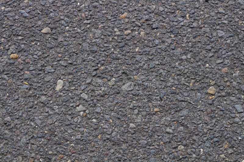 Close-up of an Asphalt Surface with a Rough Texture Composed of Small ...