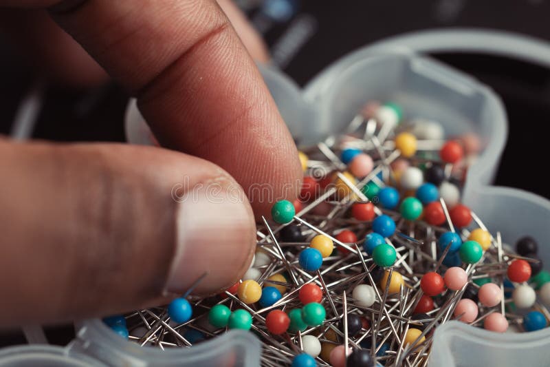 Close Up of Assortment of Colorful Sewing Pins Hand Reaching Stock ...