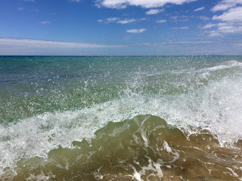 Waves Breaking on a Sandy Beach Stock Photo - Image of cabo ...