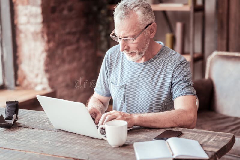 Close Up of Attentive Man with a Laptop Stock Photo - Image of kindness ...