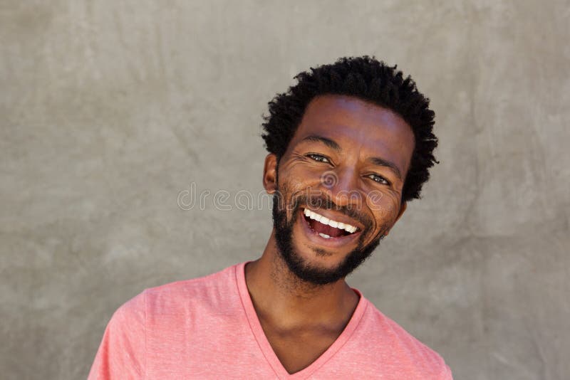 Close Up Attractive African Man Smiling by Wall Stock Image - Image of ...