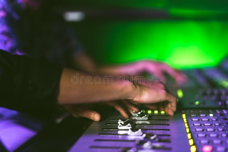 Close Up Audio Engineer Working with Panel Mixer Control Inside Music ...