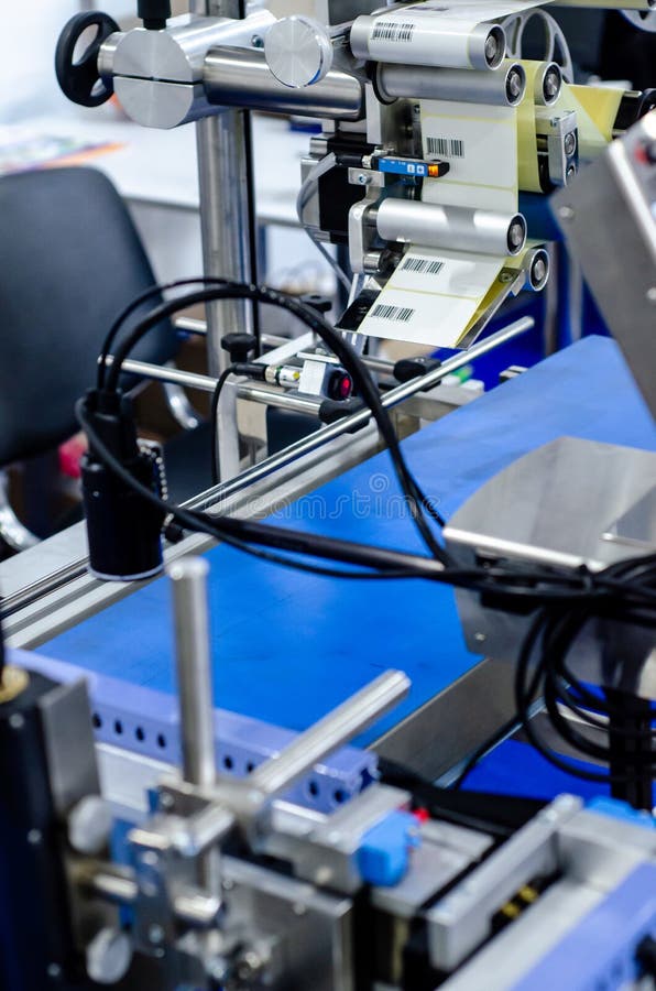 Close-up of Automatic Sticker Labelling Machine Stock Image - Image of ...