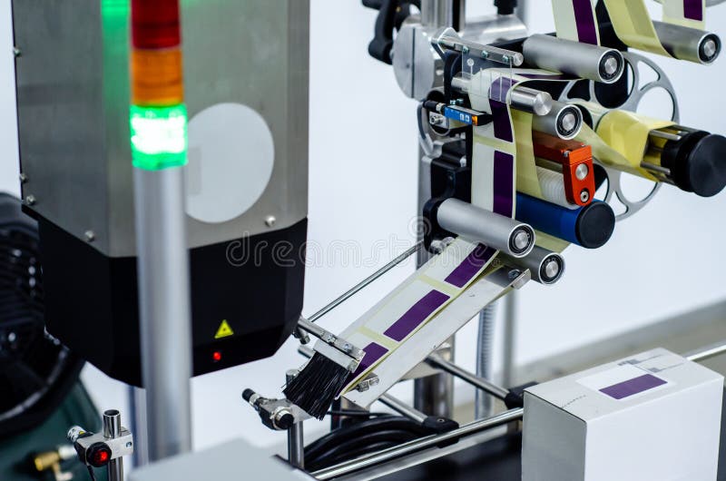 Close-up of Automatic Sticker Labelling Machine Stock Photo - Image of ...