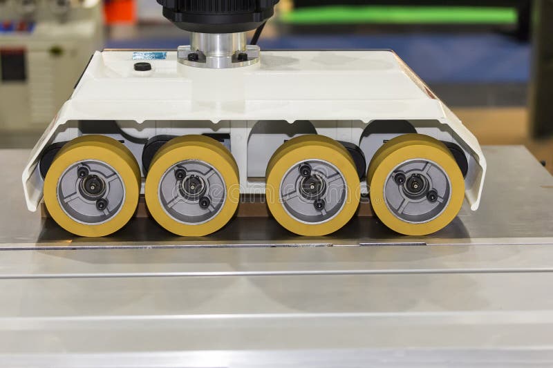 Close Up Automatic Wheel Power Feeder for Woodworking Router Panel ...