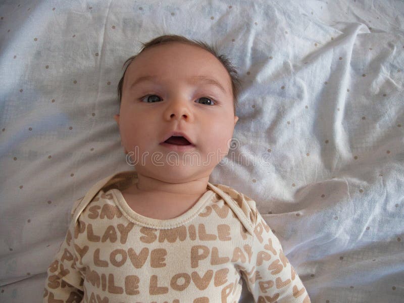 Close Up of Baby Boy S Face Looking at Camera with Cute Grin Stock ...