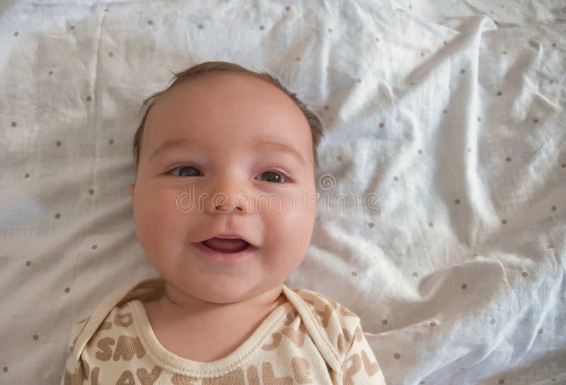 Close Up of Baby Boy S Face Looking at Camera with Cute Grin Stock ...