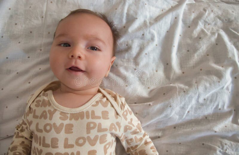 Close Up of Baby Boy S Face Looking at Camera with Cute Grin Stock ...