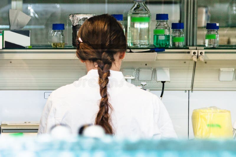Close Up of Back of Female Scientist in Laboratory Stock Image - Image ...