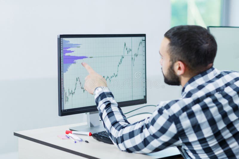 Man Using Project Management Software on Laptop Computer Stock Photo ...