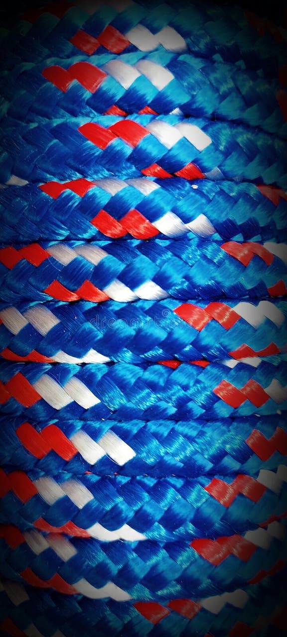 Close-up Background of Blue and Red Diamond Braided Rope with Space for ...