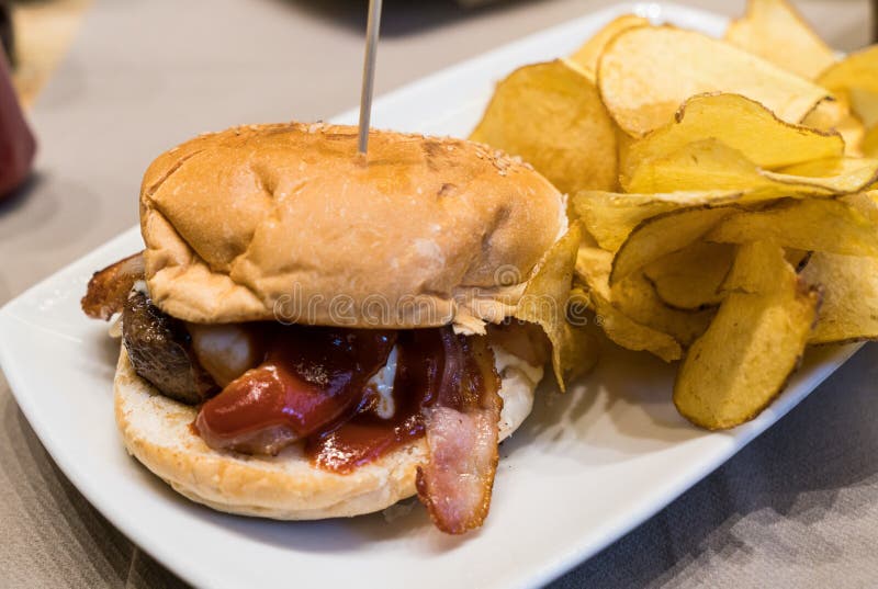 Close Up Bacon Cheese Burger with Potato Chips Stock Photo - Image of ...