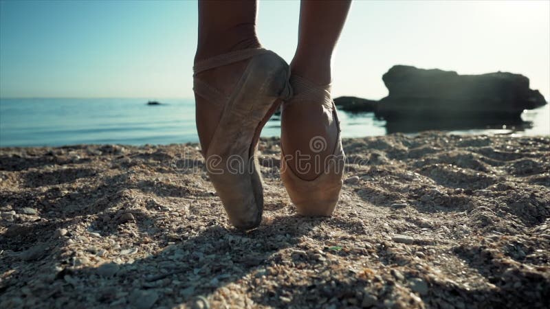 Ballet Dancer S Feet In Pointe Shoes Doing Pas Between Blue Neon Led