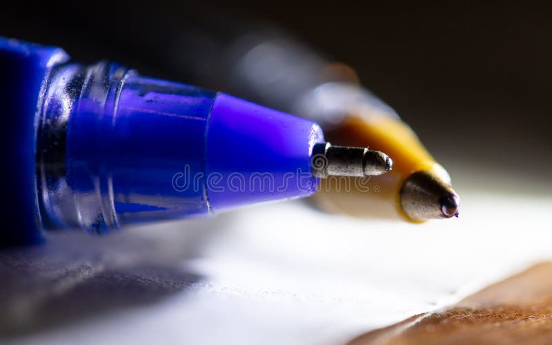 Close-up of a Ballpoint Pen on a Table in the Light of a Lantern Stock ...