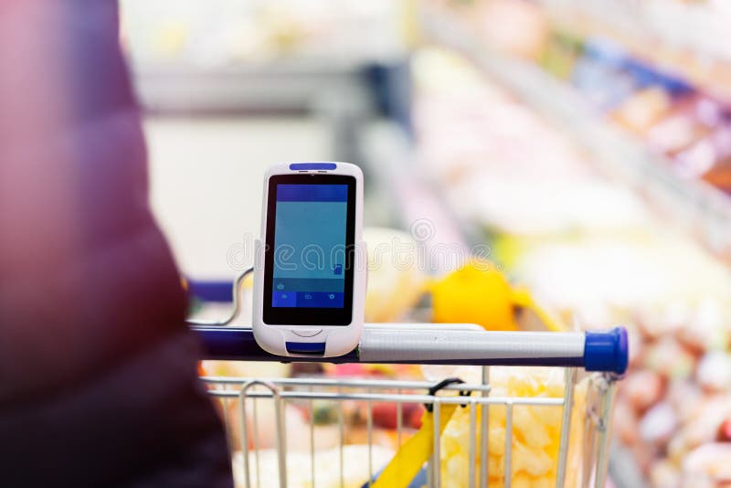 Close Up of Bar Code Scanner on Shopping Cart in Store. Concept of ...