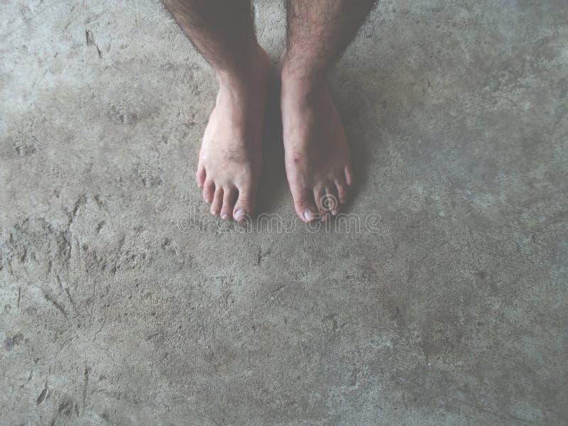 Bare Feet of Man on Cement Floor Stock Image - Image of care, health ...