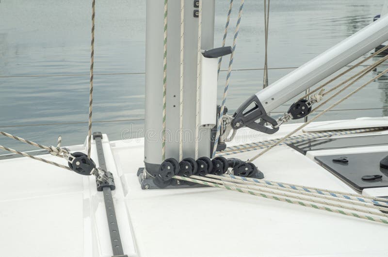 Close Up of the Base of Yacht Mast, Featuring the Rigging and Sail Control Hardware Stock Photo ...