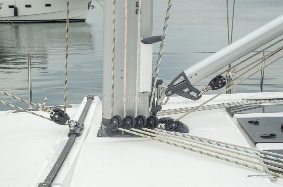 Close Up of the Base of Yacht Mast, Featuring the Rigging and Sail Control Hardware Stock Image ...