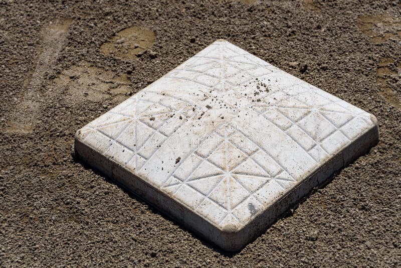 Close Up of Baseball Base Plate on a Freshly Groomed Dirt Field Stock ...