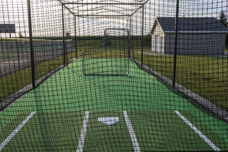 A Close Up of Baseball Batting Cage on the First Base Side of the Field ...