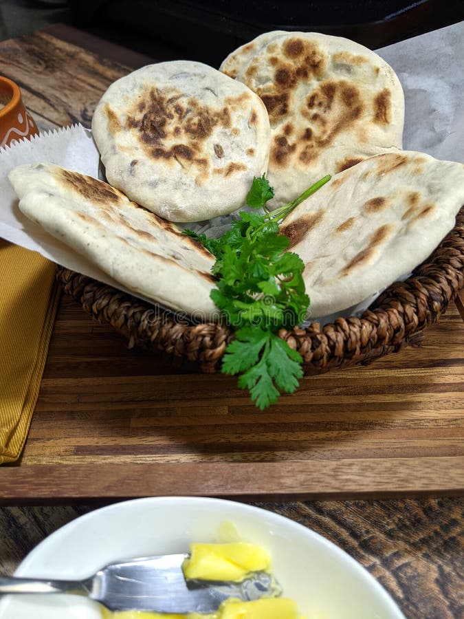 A Close Up of a Basket of Baati Roti for Breakfast Stock Image - Image ...