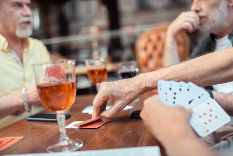 Close Up of Bearded Men Gambling and Talking Stock Image - Image of ...