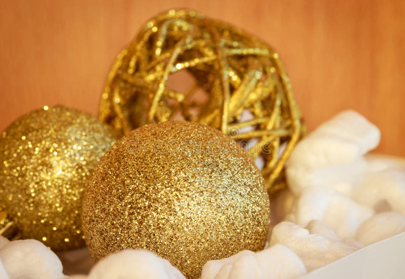 Close Up Beautiful Golden Glitter Balls on Snow Stock Image - Image of ...