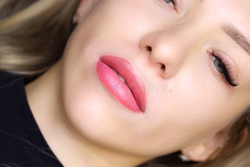 The Beautiful Lips of a Young Model with a Lip Tattoo Stock Image ...