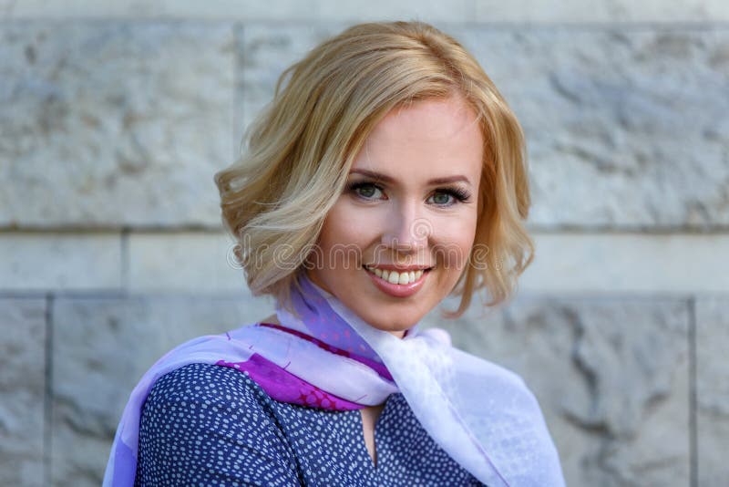 Close-up of Beautiful Smiling Blond Model Near Stone Wall Stock Image ...