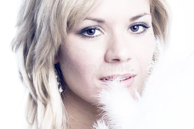 Close-up of Beautiful Woman with White Feather Stock Photo - Image of ...