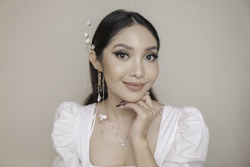 Close-up Beauty Face of Asian Young Model Wearing Ear Accessories or ... Close-up Beauty Face of Asian Young Model Wearing Ear Accessories or ...