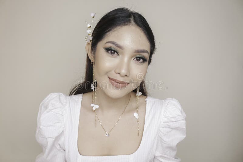 Close-up Beauty Face of Asian Young Model Wearing Ear Accessories or ... Close-up Beauty Face of Asian Young Model Wearing Ear Accessories or ...