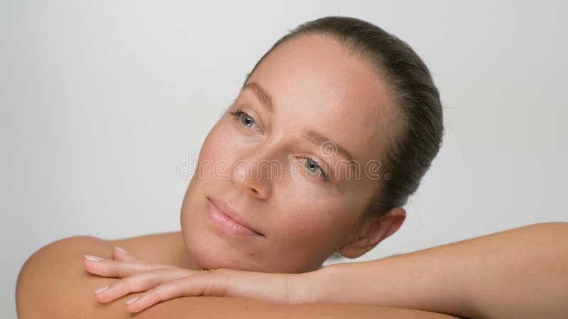 Close Up Beauty Portrait Of Young Woman With Smooth Healthy Skin She Gently Touches Her Face
