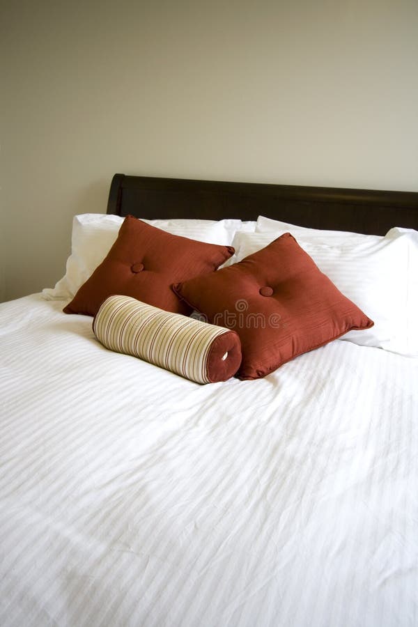 Close Up on a Bed in a Bedroom Stock Image - Image of pillows, bedding ...