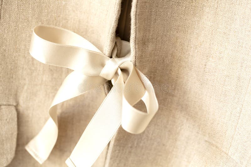 Close-up of the Beige Satin Ribbon of a Beige Jacket Stock Photo ...