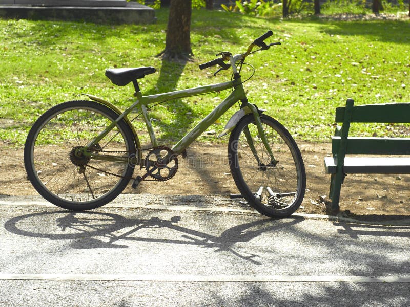Close Up Bicycle and Shadow on Road Stock Image - Image of daylight ...