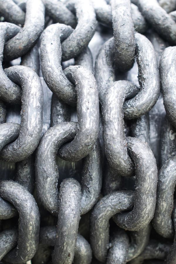 Metal Industrial Chain Close Up Rolled Up on a Coil Stock Image - Image ...