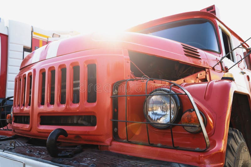 Close-up of Big Red Fire Truck with Headlights and a Bumper Stock Photo ...