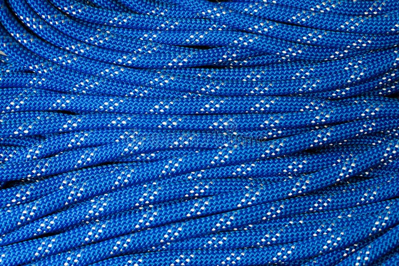 Dynamic Rope, Helmet, Carabiners, Climbing Harness and Descender on the ...