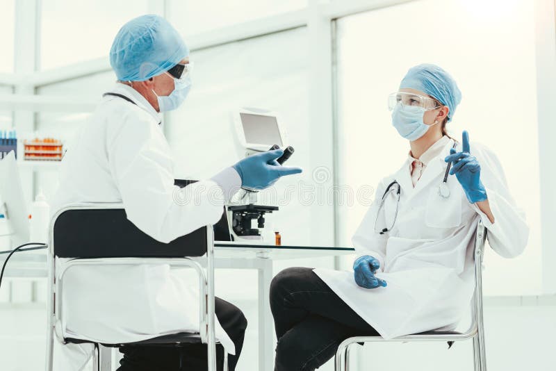 Close Up. Biologists Discussing Something in the Lab Stock Image ...